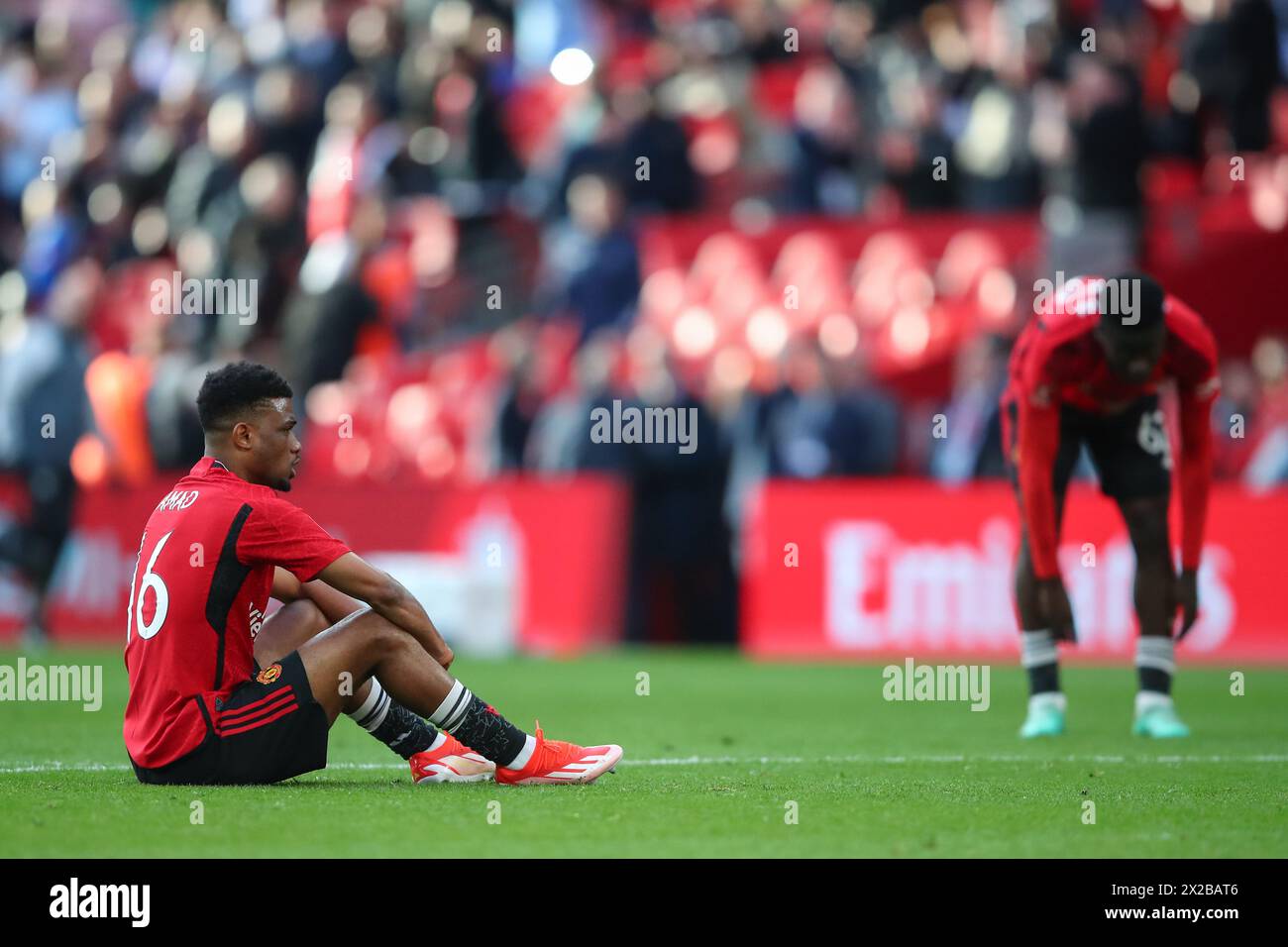 Amad Diallo of Manchester United reacts to Victor Torp of Coventry City ...