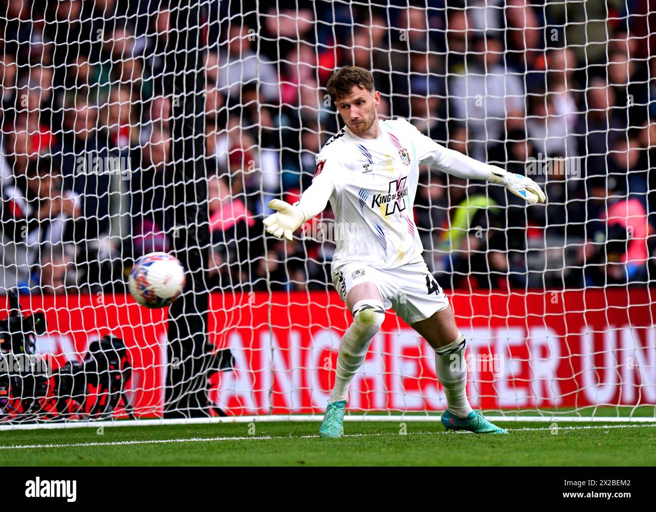 Coventry City goalkeeper Bradley Collins fails to make a save during ...