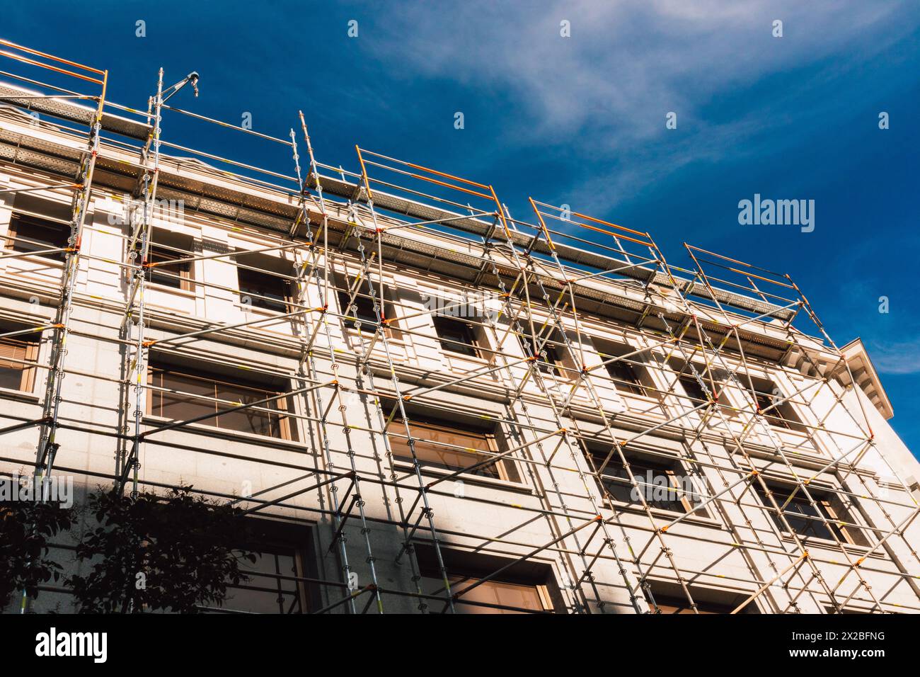 Scaffolding construction on a facade building. Thermal insulation of a ...