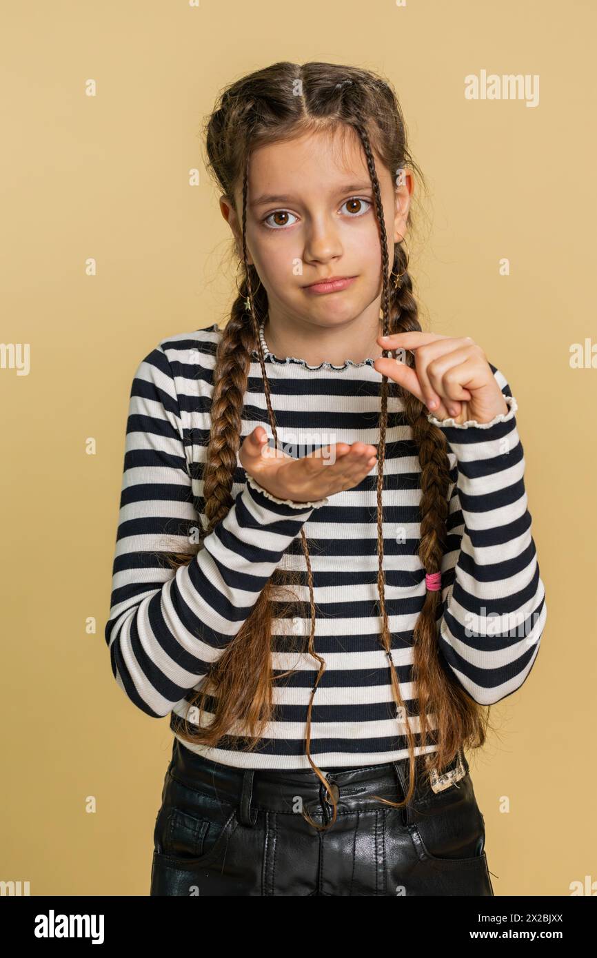 Need some more, please give me. Young preteen child girl kid showing a ...