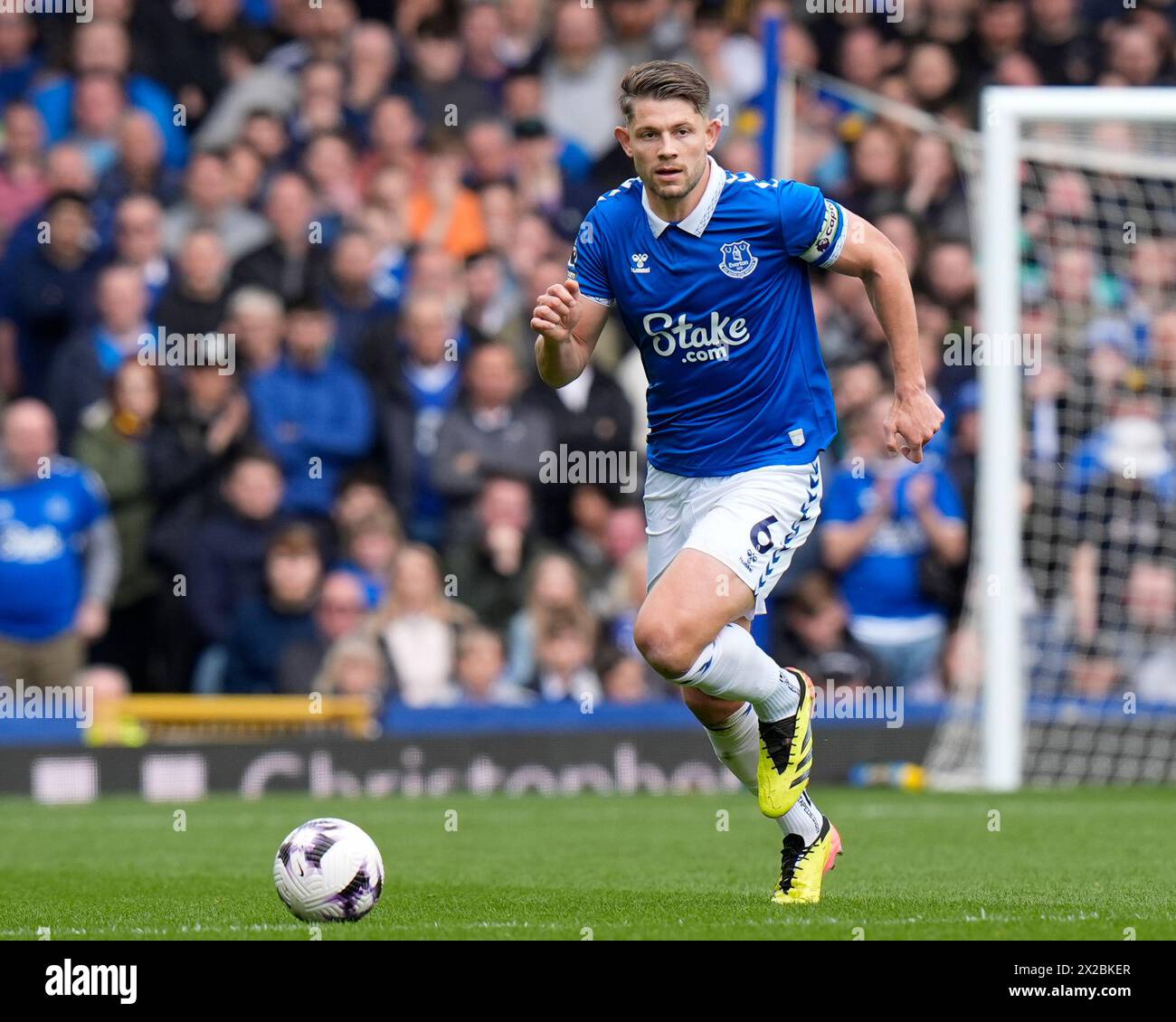 Liverpool, UK. 21st Apr, 2024. James Tarkowski of Everton runs with the ...