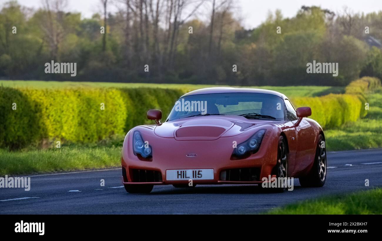 Bicester,UK- Apr 21st2024: 2005 orange TVR Sagaris classic car driving ...