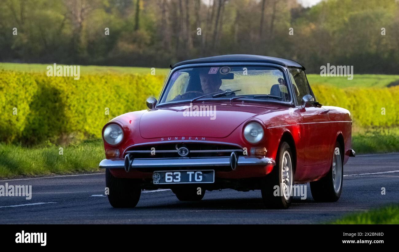 Bicester,UK- Apr 21st2024: 1965 red Sunbeam Tiger classic car driving ...