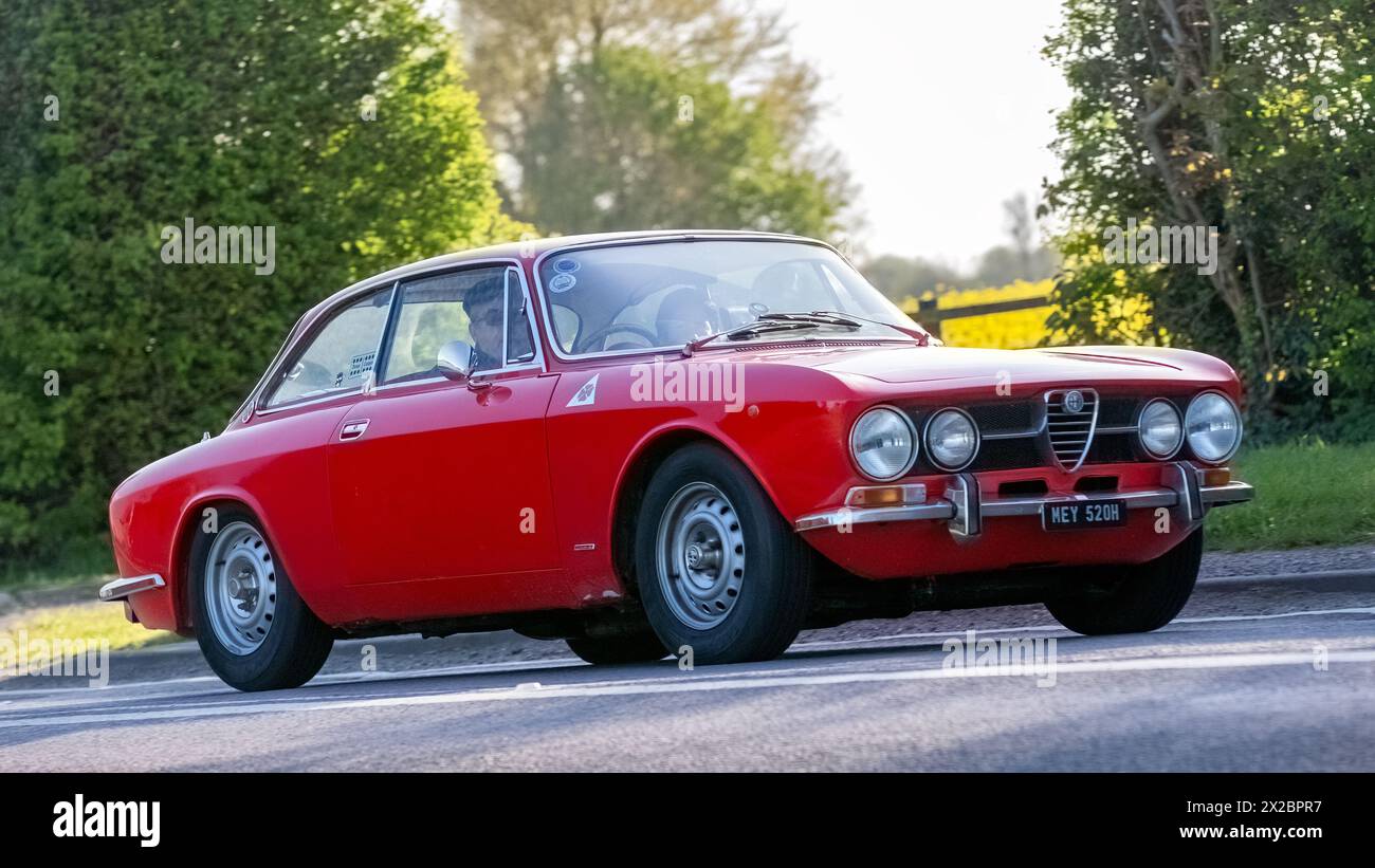 Bicester,UK- Apr 21st2024: 1970 red Alfa Romeo 1750 classic car driving ...