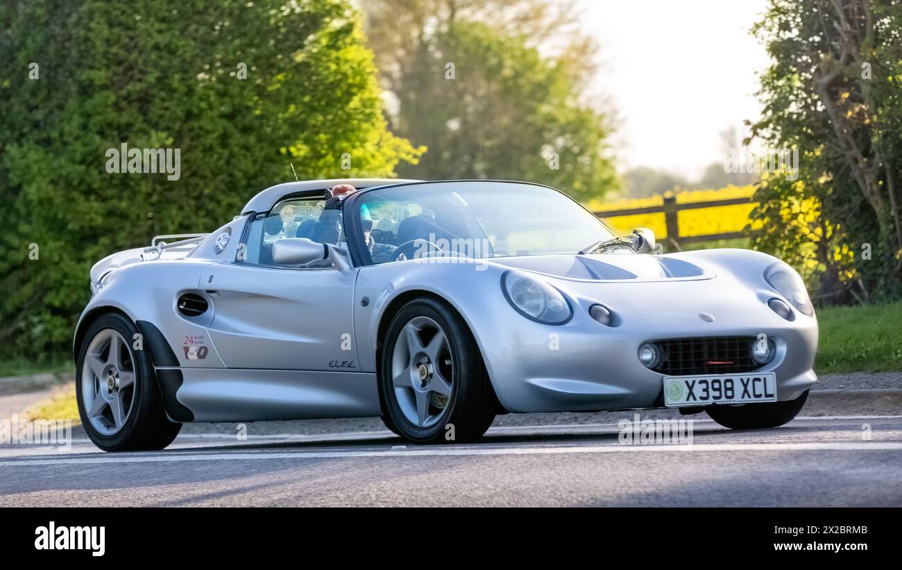 Bicester,UK- Apr 21st2024: 2000 Lotus Elise classic car driving on a ...