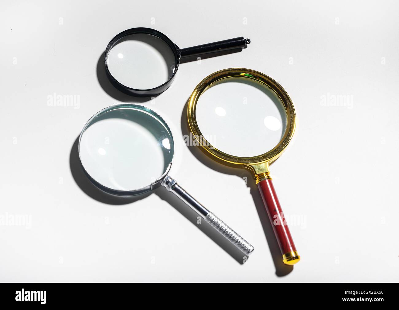 Glass magnifies many mysteries. Three lenses zoom background ...