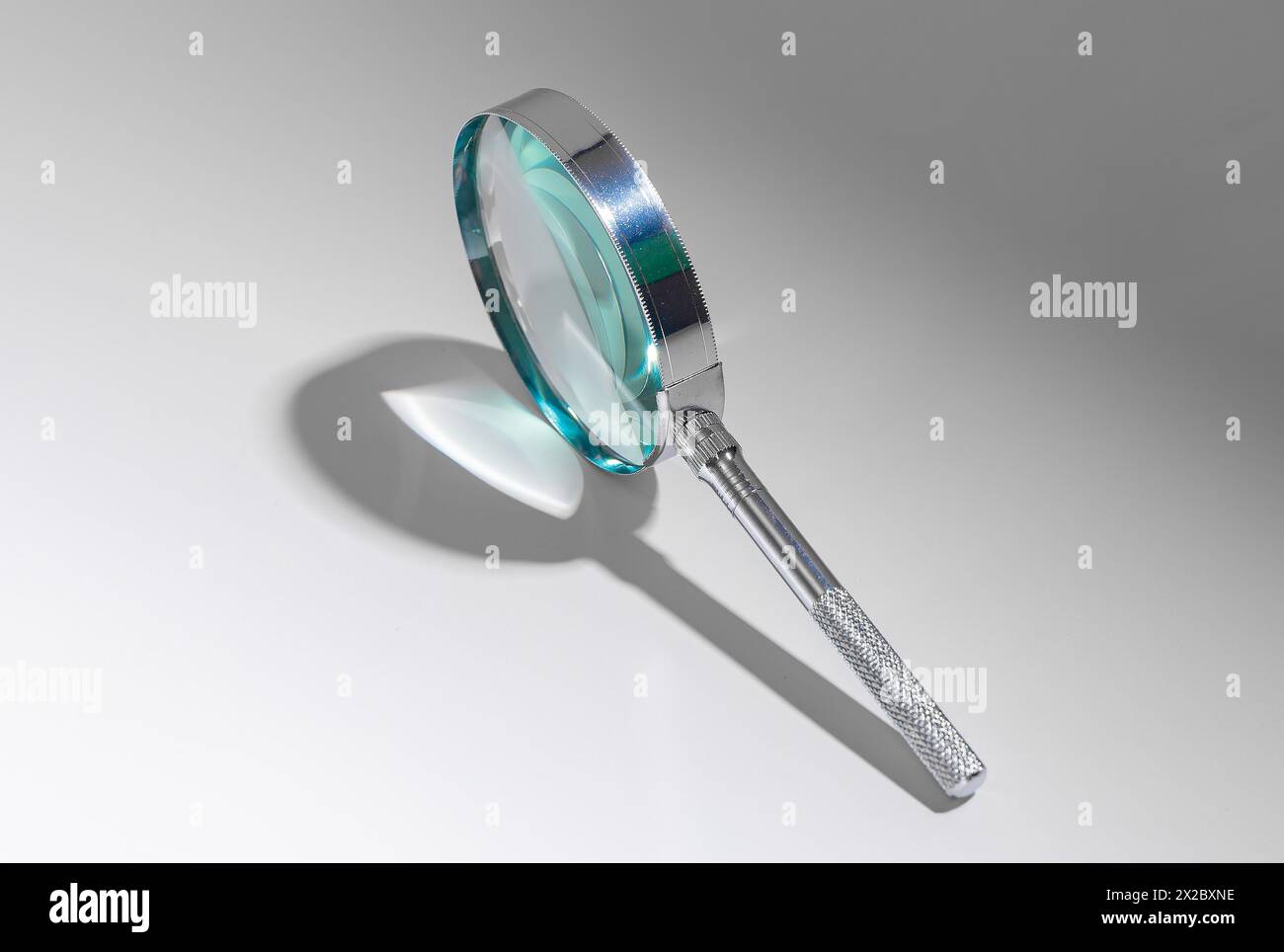 Magnify glass, silver metal, lens. Search background, zoom loupe ...