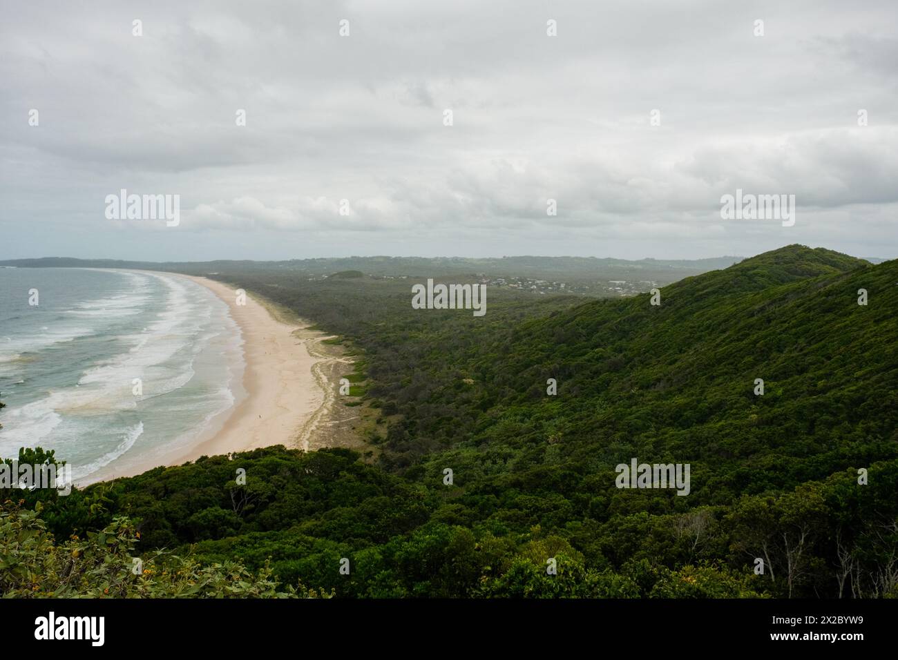 A sweeping panoramic view captures the serene beauty of Byron Bay's ...