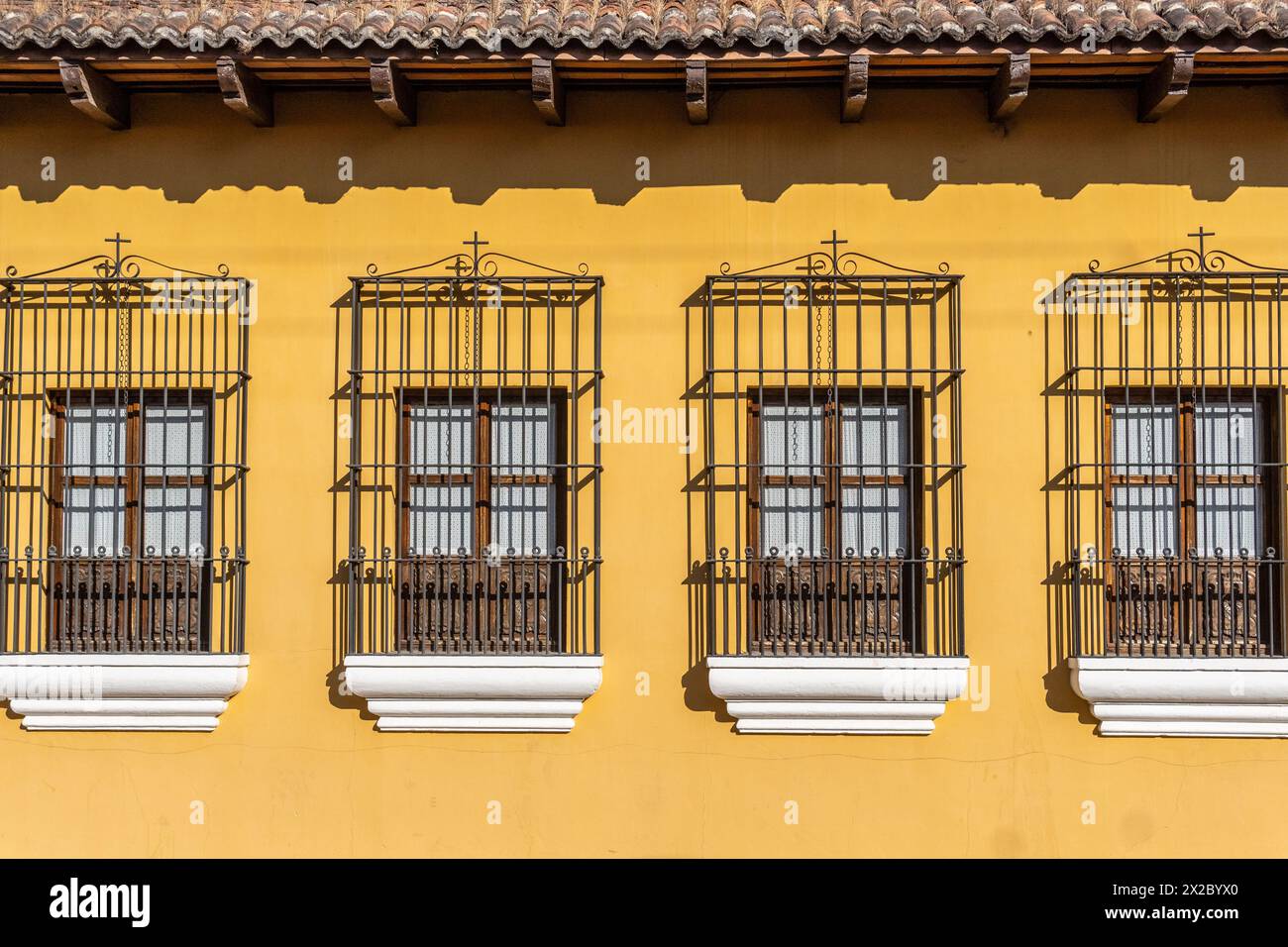 yellow colonial wall in Antigua Guatemala Stock Photo - Alamy