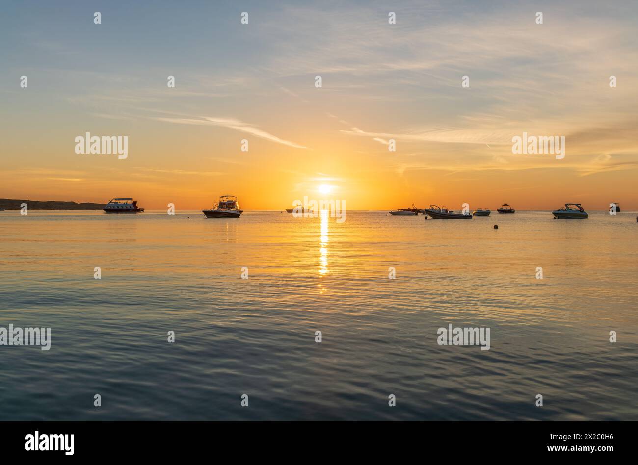 Sunrise over the sea. Panoramic seascape. Burning sky and shining ...