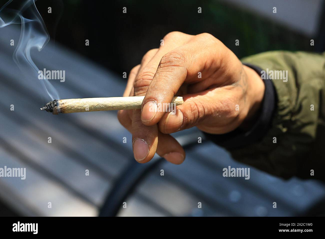 A man holds a joint while attending the 420 Festivities at Washington ...
