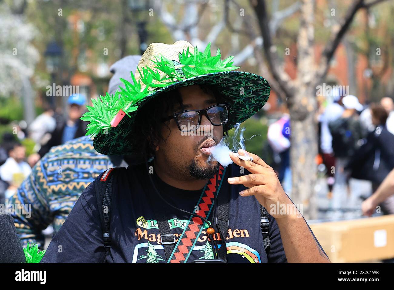 A man smoking weed is dressed for the day at the 420 Festivities at ...