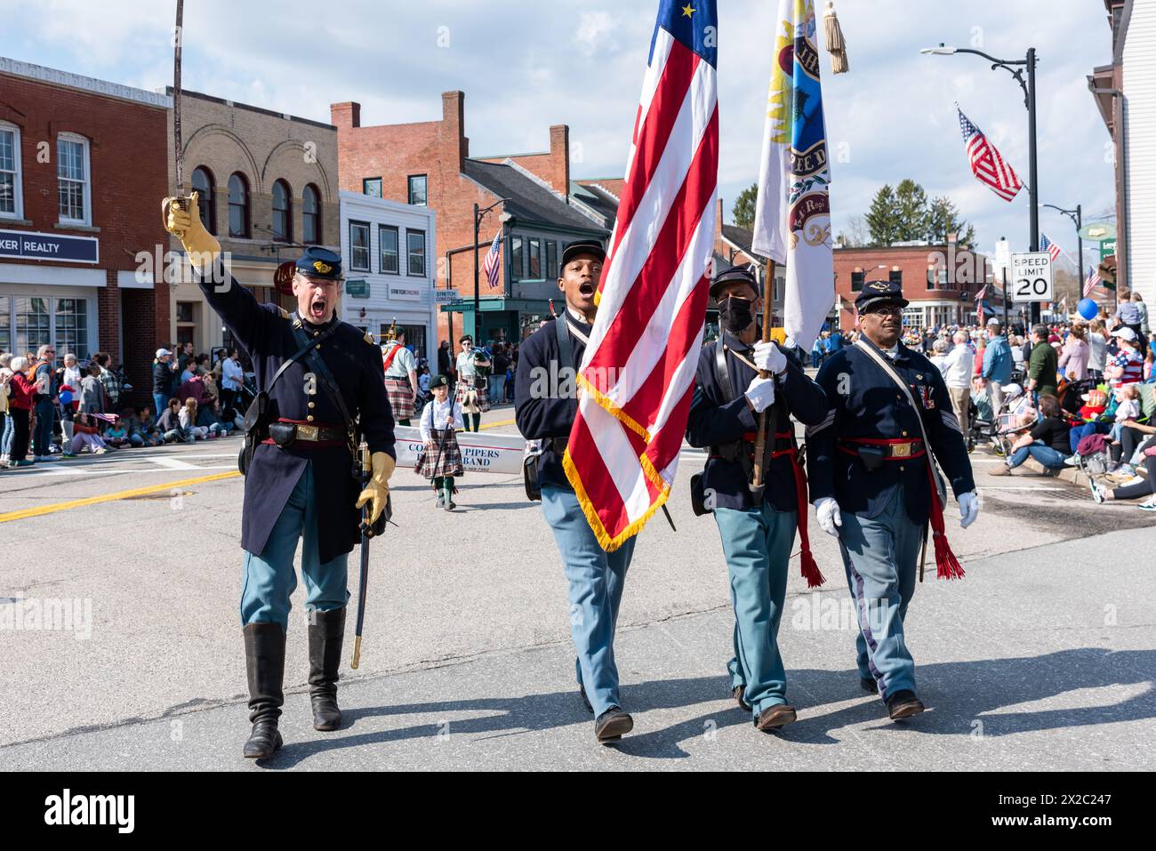 David Hencke raising his sword and yelling with emotion as he leads the ...