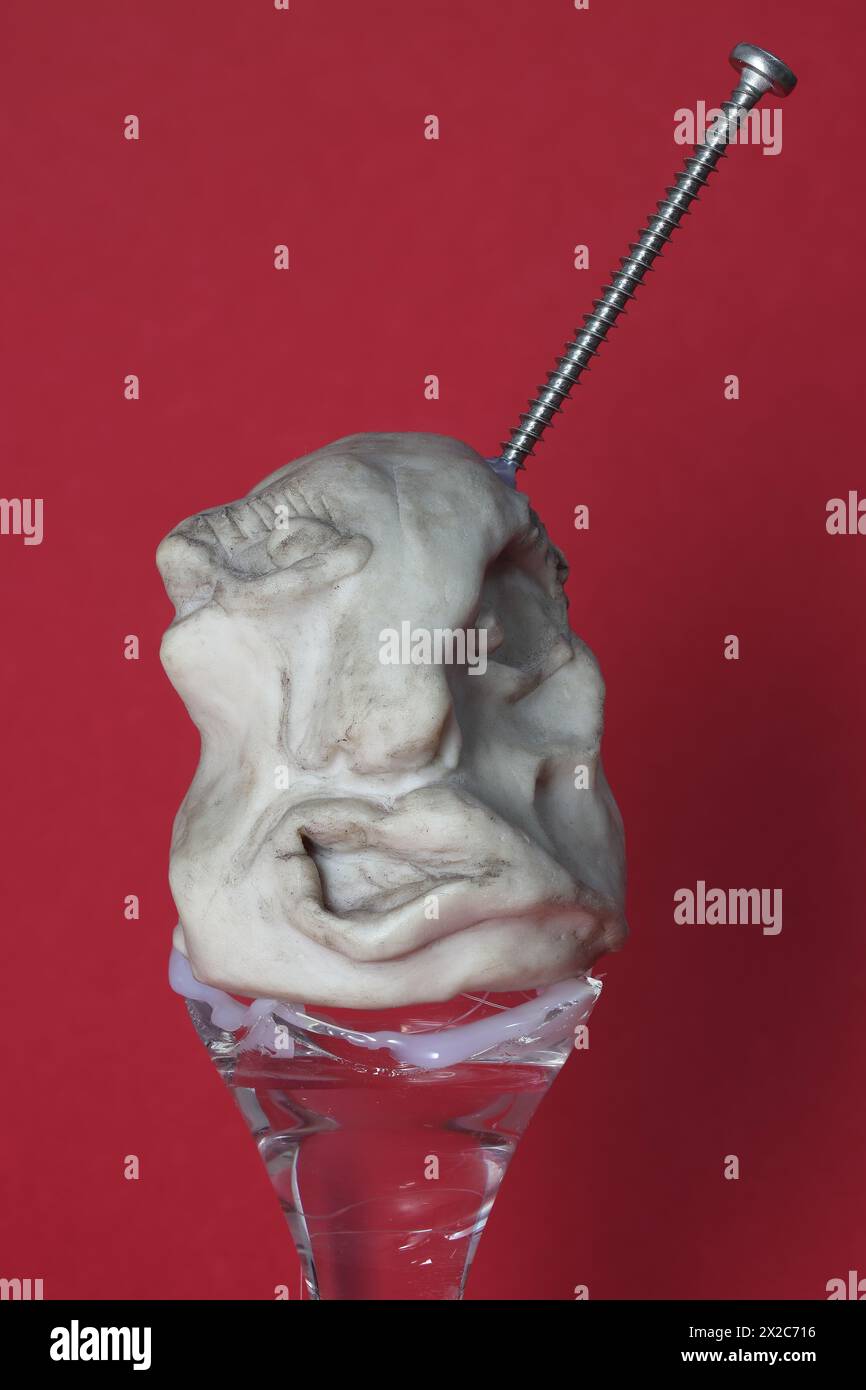 Still life with an old dusty head and screw; beware of drugs Stock ...