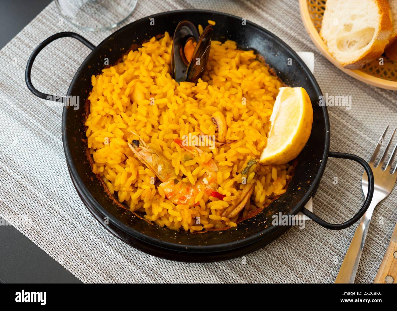 National Spanish dish is paella with seafood Stock Photo - Alamy