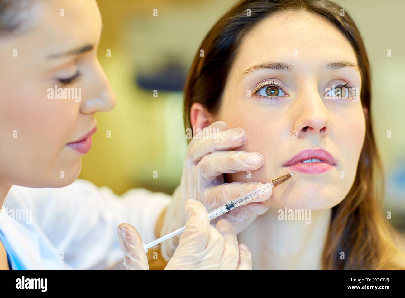 Syringe. Botox, cosmetic medicine. Botulinum toxin treatment involves ...