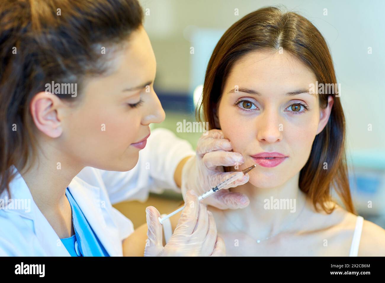 Syringe. Botox, cosmetic medicine. Botulinum toxin treatment involves ...