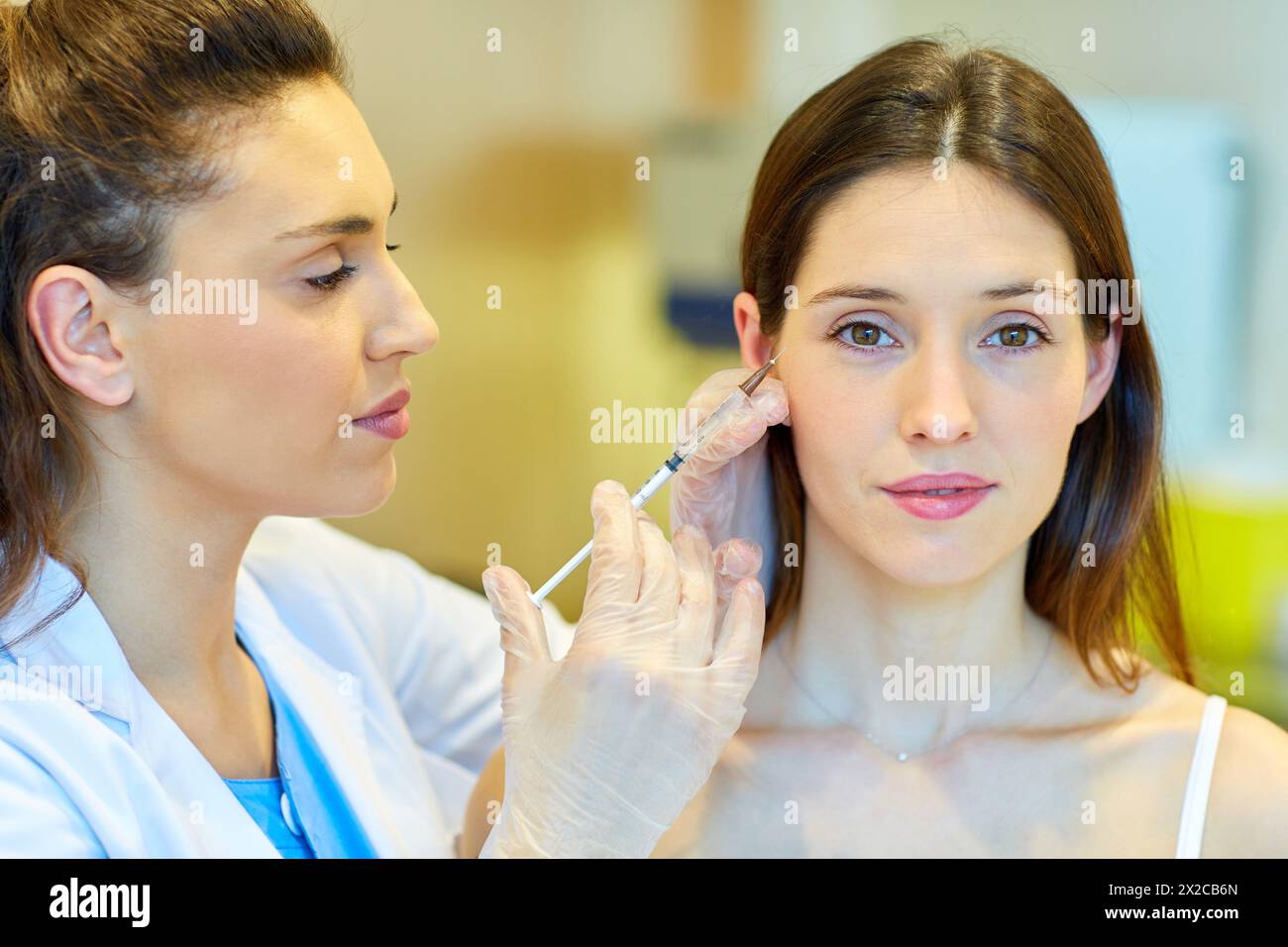Syringe. Botox, cosmetic medicine. Botulinum toxin treatment involves ...