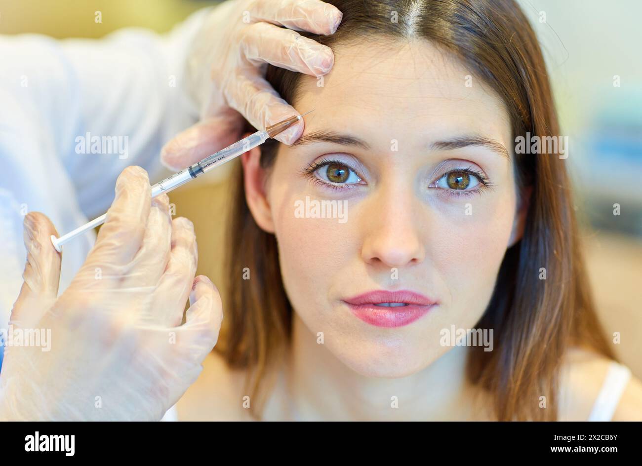 Syringe. Botox, cosmetic medicine. Botulinum toxin treatment involves ...