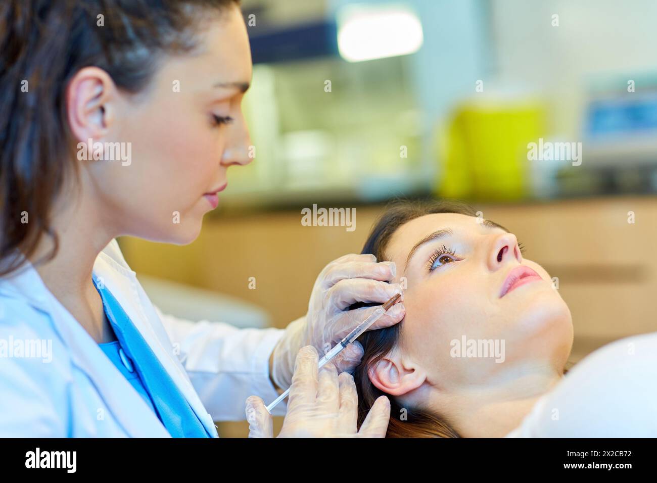 Syringe. Botox, cosmetic medicine. Botulinum toxin treatment involves ...