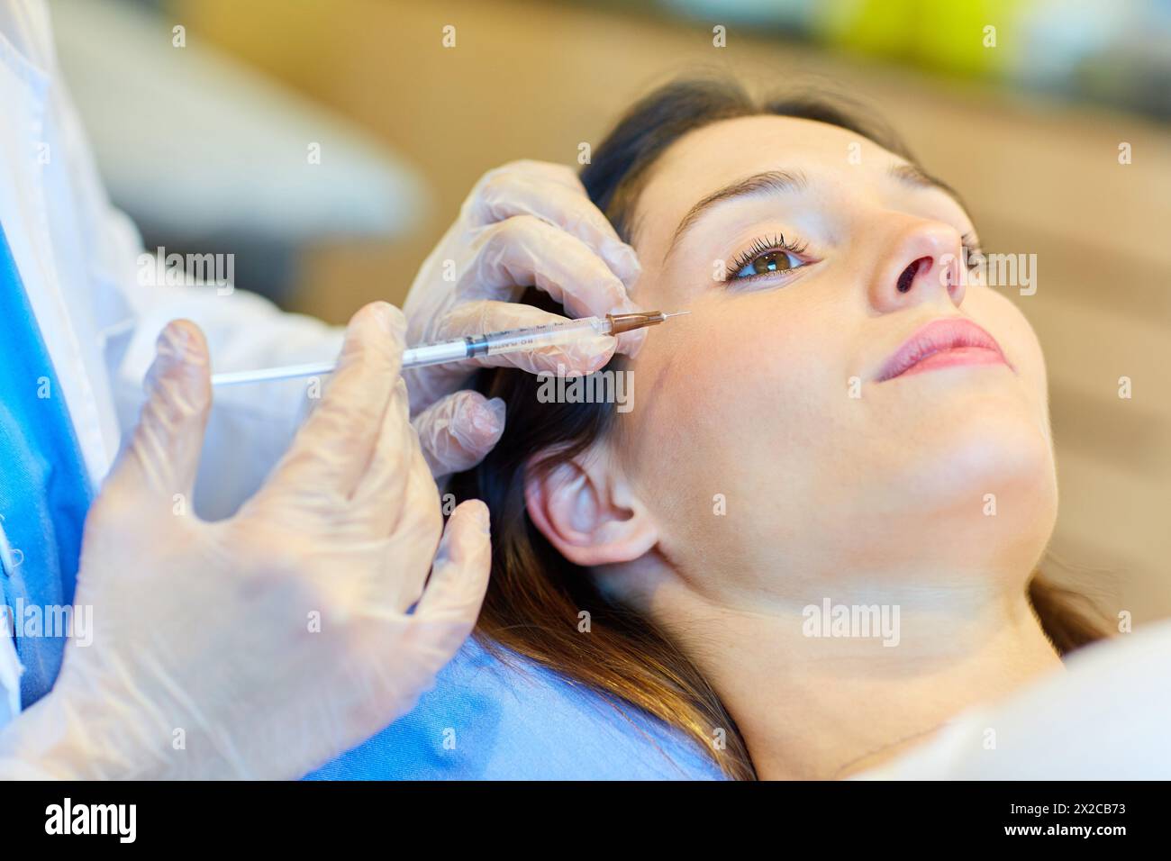 Syringe. Botox, cosmetic medicine. Botulinum toxin treatment involves ...