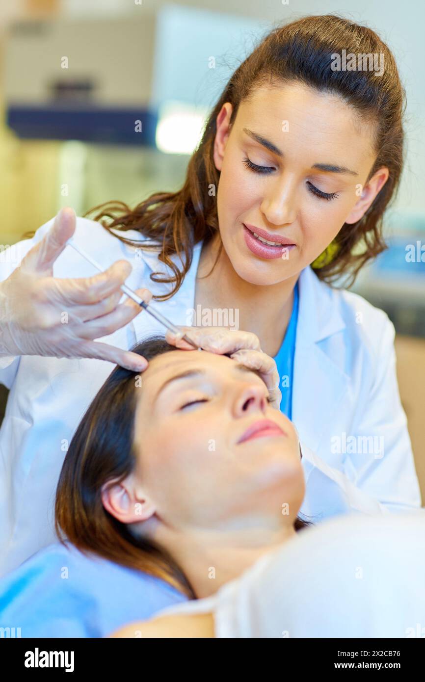 Syringe. Botox, cosmetic medicine. Botulinum toxin treatment involves ...