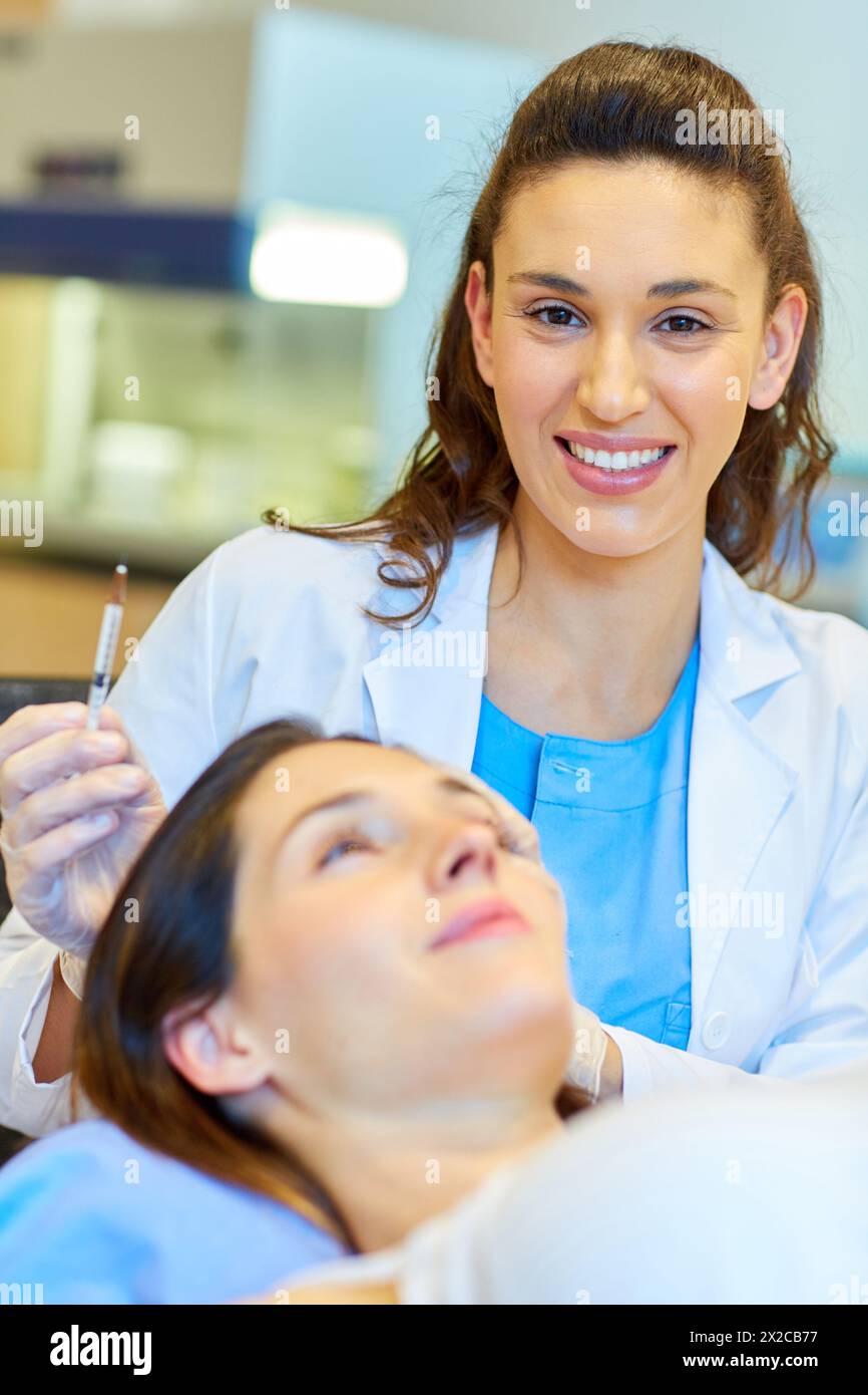 Syringe. Botox, cosmetic medicine. Botulinum toxin treatment involves ...