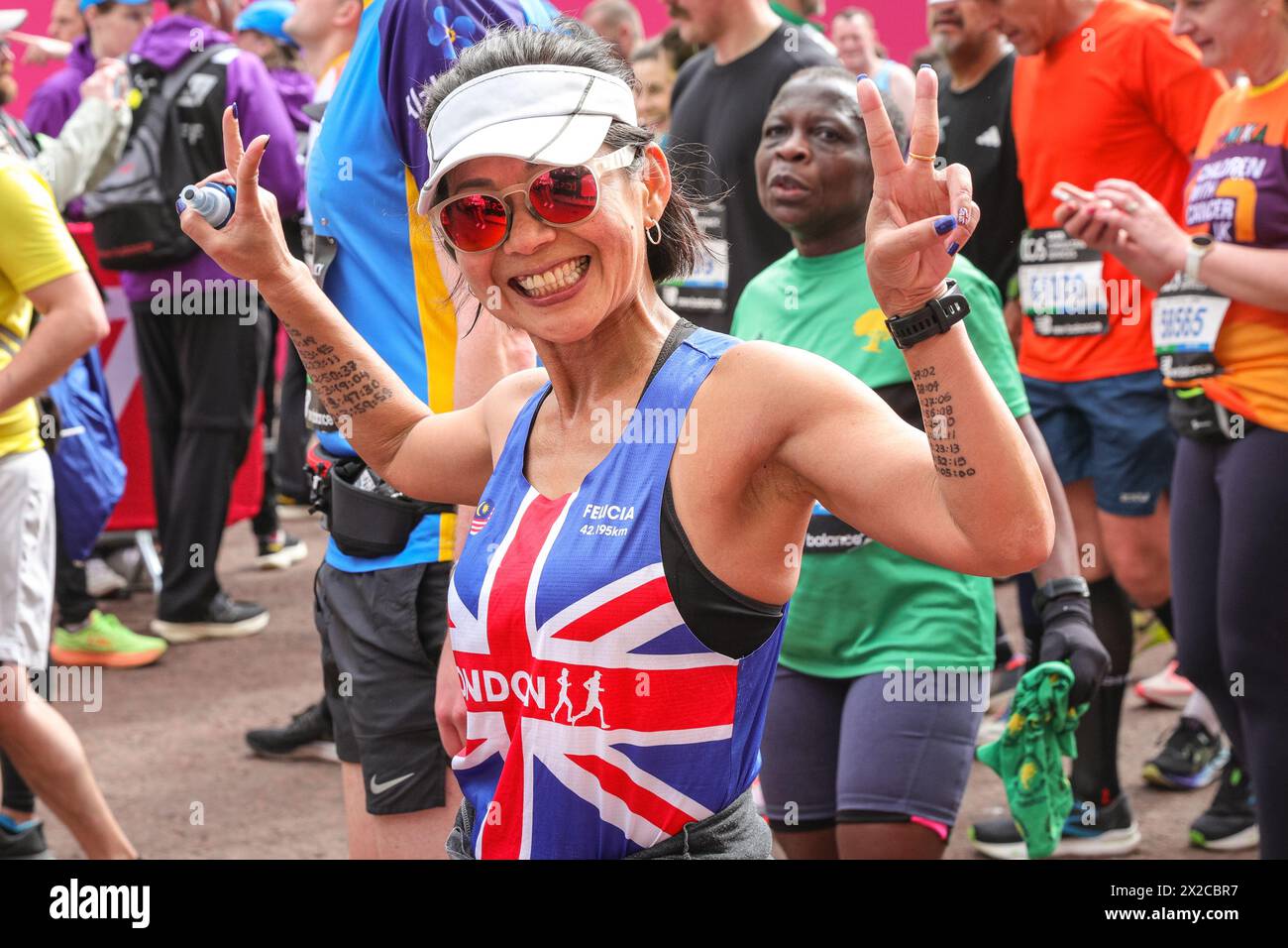 London, UK. 21st Apr, 2024. Runners in the mass races, amongst them ...