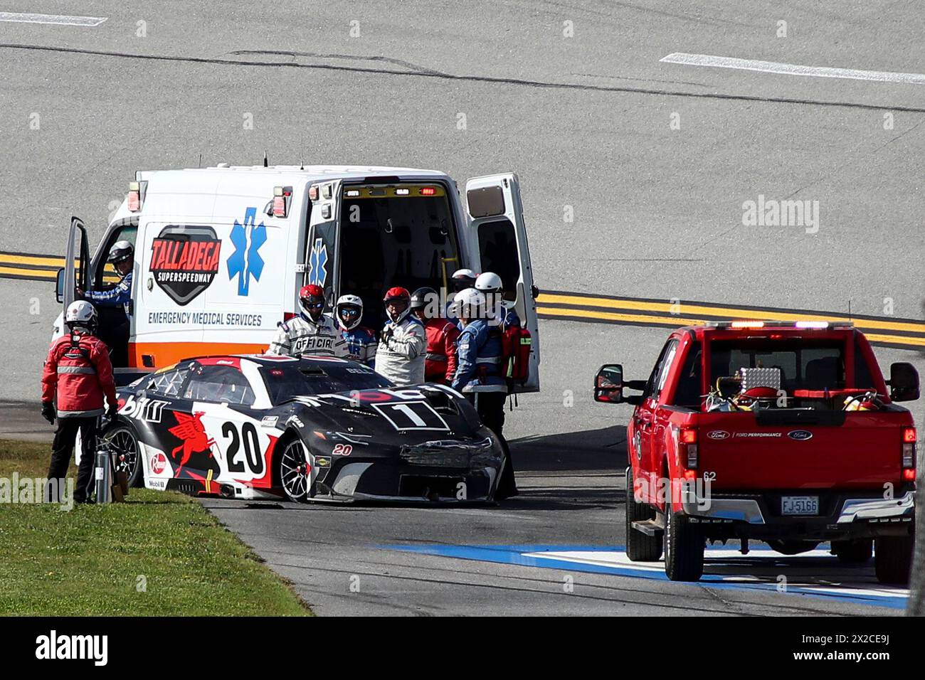 NASCAR Cup Series driver Christopher Bell (20) is helped after a ...