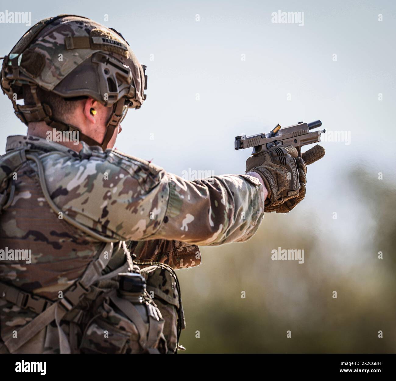 U.S. Army Soldiers engage targets as part of a stress shoot on day 2 of ...