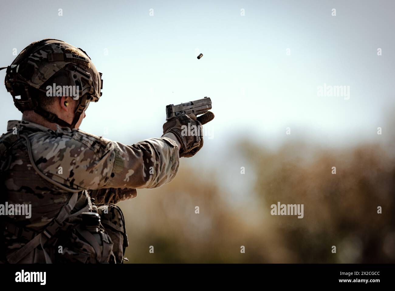U.S. Army Soldiers engage targets as part of a stress shoot on day 2 of ...