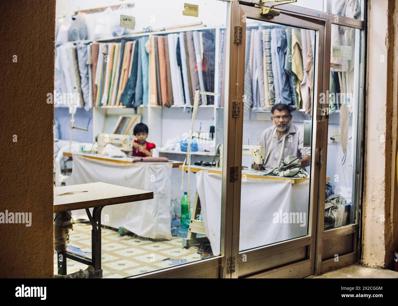 Sewing family store, old style shop, simple life, child labour ...