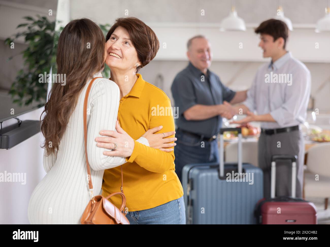 Son welcoming father home hi-res stock photography and images - Alamy