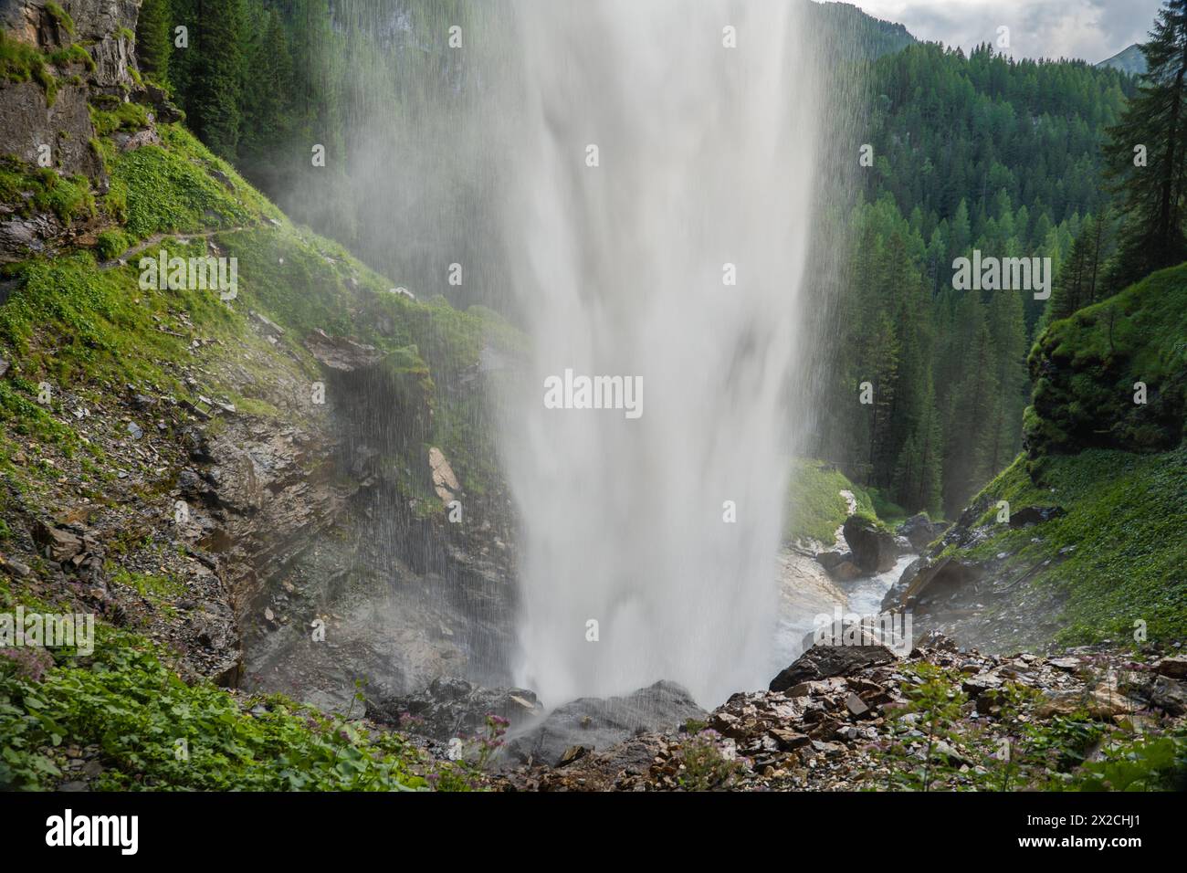waterfall .Streams of water crash on rocks and boulders. stormy stream ...