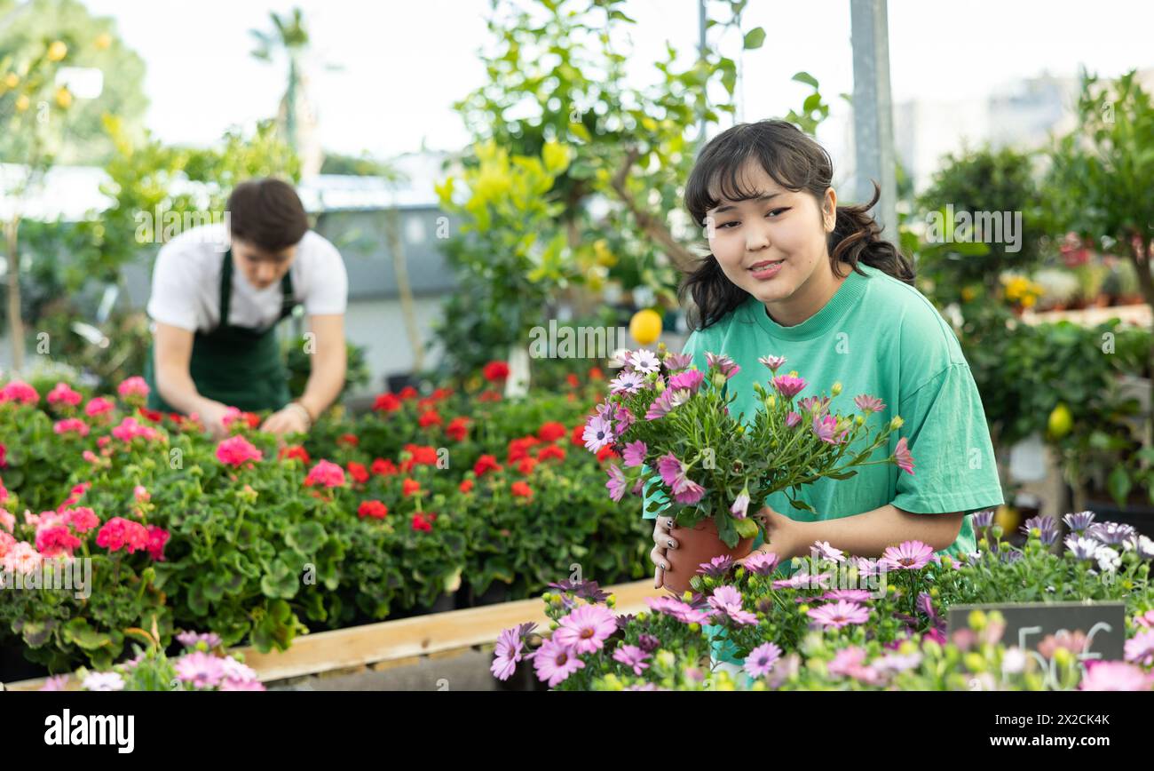 Young client garden center hi-res stock photography and images - Alamy
