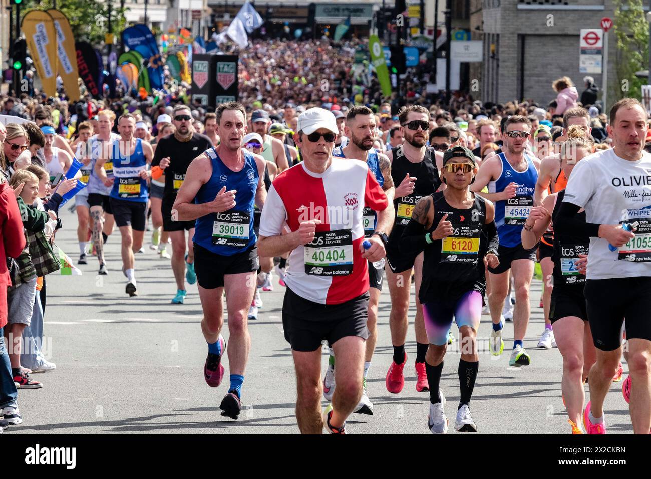 London Marathon 2024: The mass of runners makes its way through ...