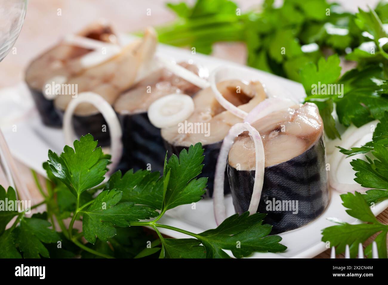 Sliced lightly salted mackerel fish served with onion and greens Stock ...