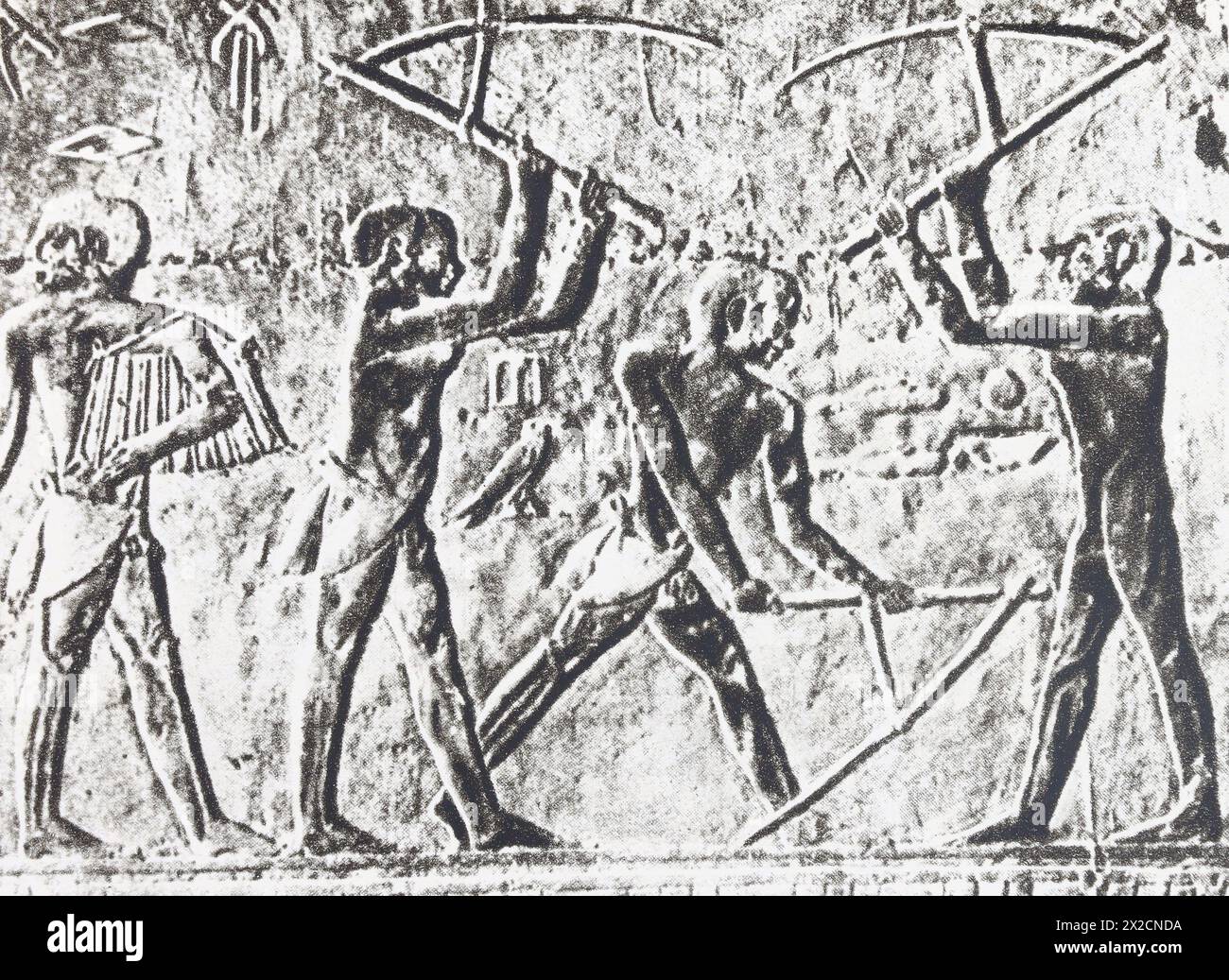 Relief from Memphis depicting digging up the earth with hoes and sowing ...