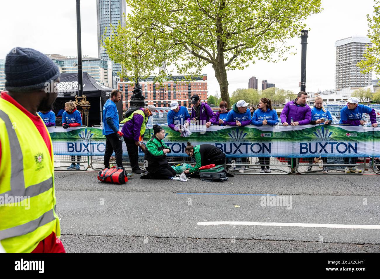 London, UK. 21st Apr, 2024. Milkesa Mengesha collapses at 39 km marker ...