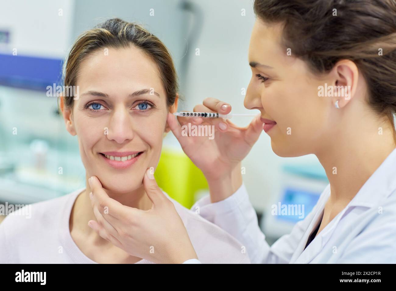 Syringe. Botox, cosmetic medicine. Botulinum toxin treatment involves ...