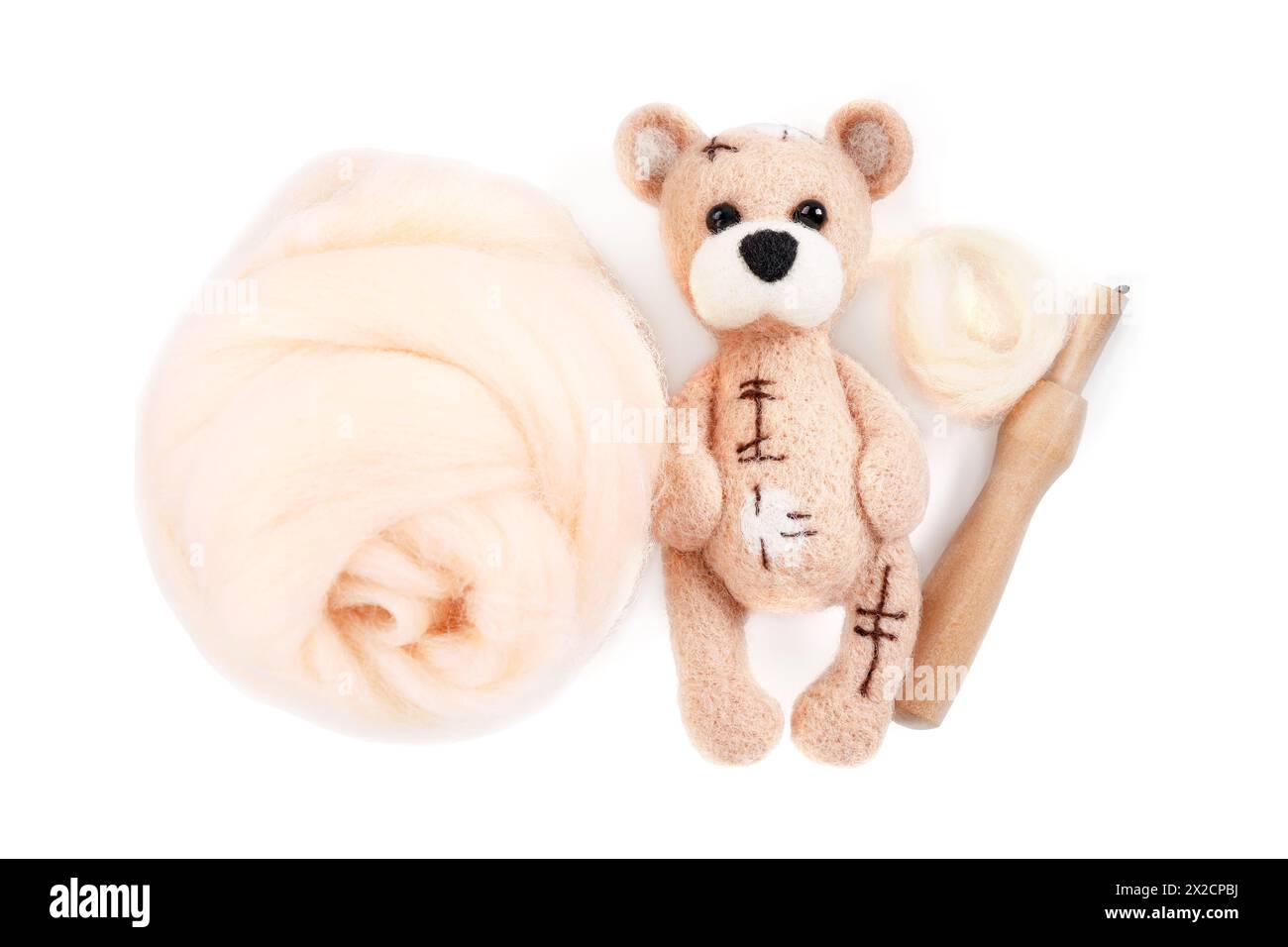 Needle felted bear, wool and holder isolated on white, top view Stock ...