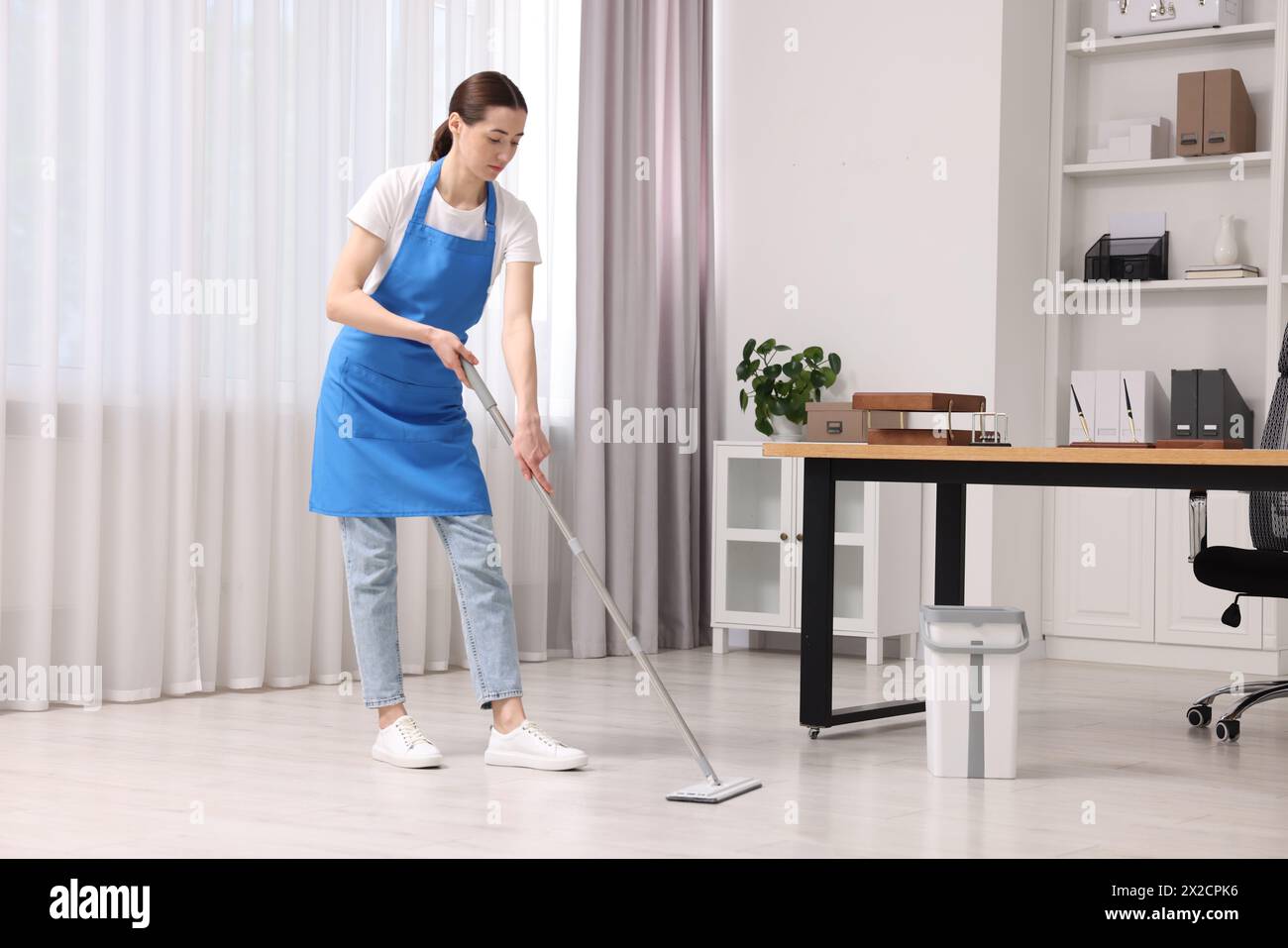 Woman clean floor office hi-res stock photography and images - Alamy