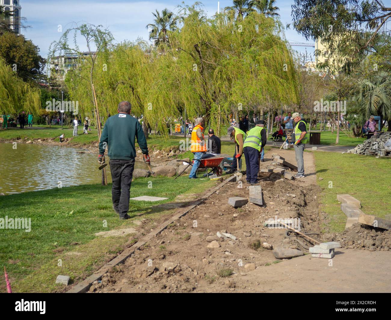 Batumi, Georgia. 04.16.2024 Workers are making a pedestrian path. Lay ...