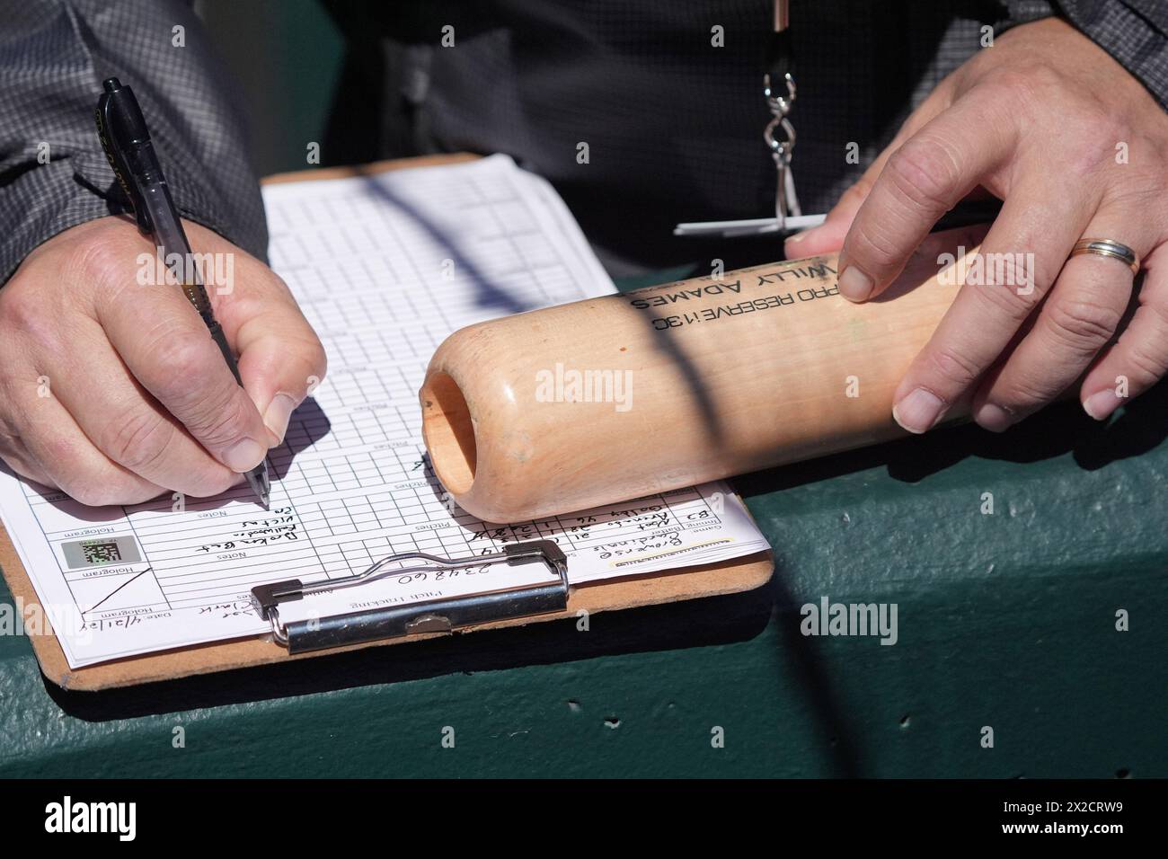 St. Louis, United States. 21st Apr, 2024. A MLB authenticator records ...