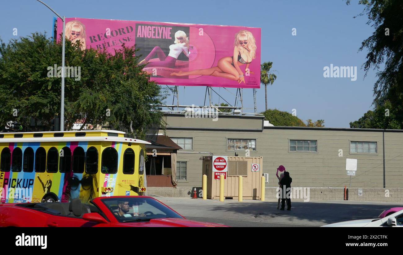 West Hollywood, California, USA 21st April 2024 Angelyne wearing a mask ...