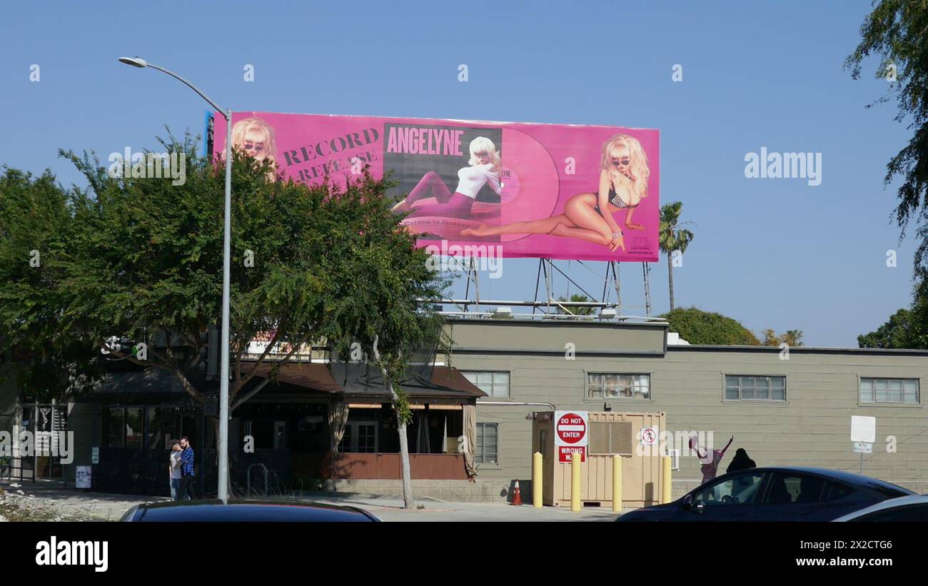 West Hollywood, California, USA 21st April 2024 Angelyne wearing a mask ...