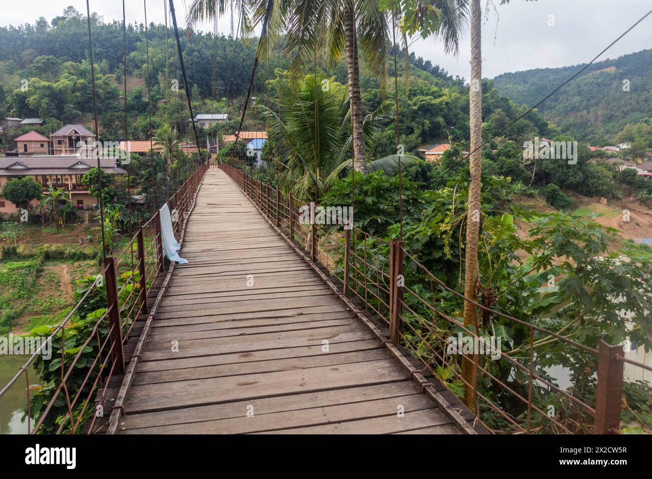 Suspension foot bridge in Muang Khua town, Laos Stock Photo - Alamy