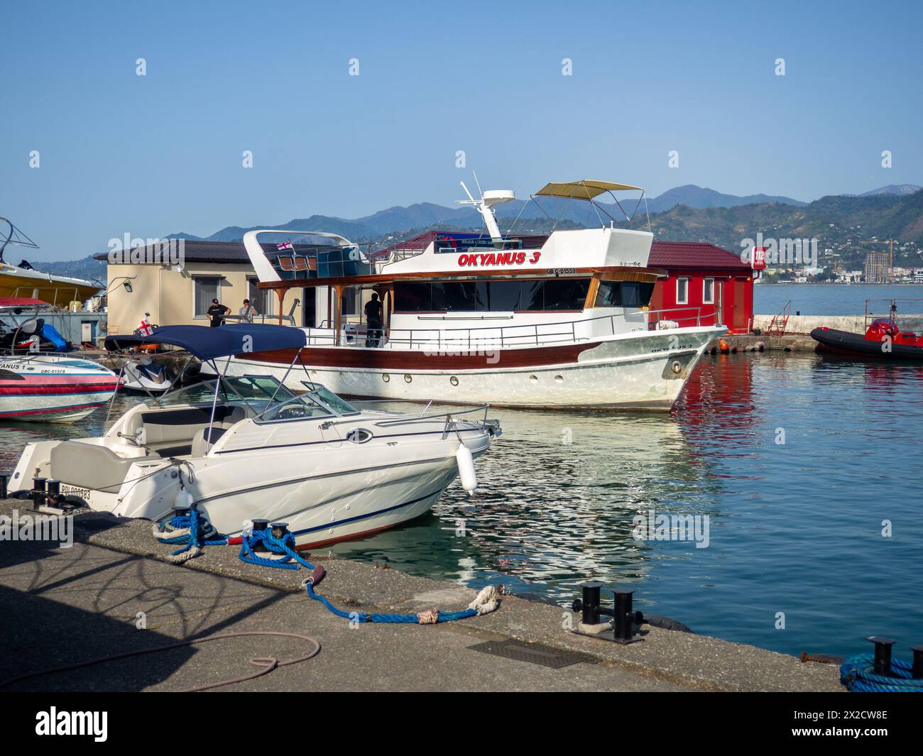 Batumi, Georgia. 04.18.2024 Ships and boats at the pier. Resort port ...