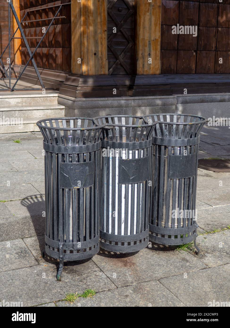 Modern trash cans in the park. Caring for the environment. Garbage bin ...