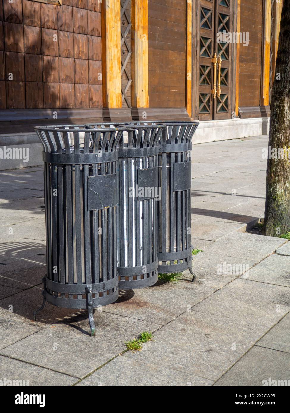 Modern trash cans in the park. Caring for the environment. Garbage bin ...